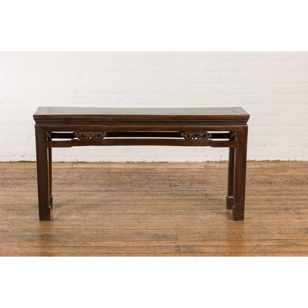 Low Narrow Display Table with Brown Patina and Carved Apron | FEA Home