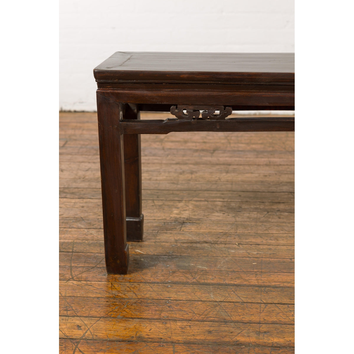 Low Narrow Display Table with Brown Patina and Carved Apron | FEA Home