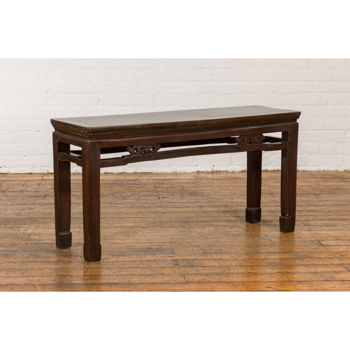 Low Narrow Display Table with Brown Patina and Carved Apron | FEA Home